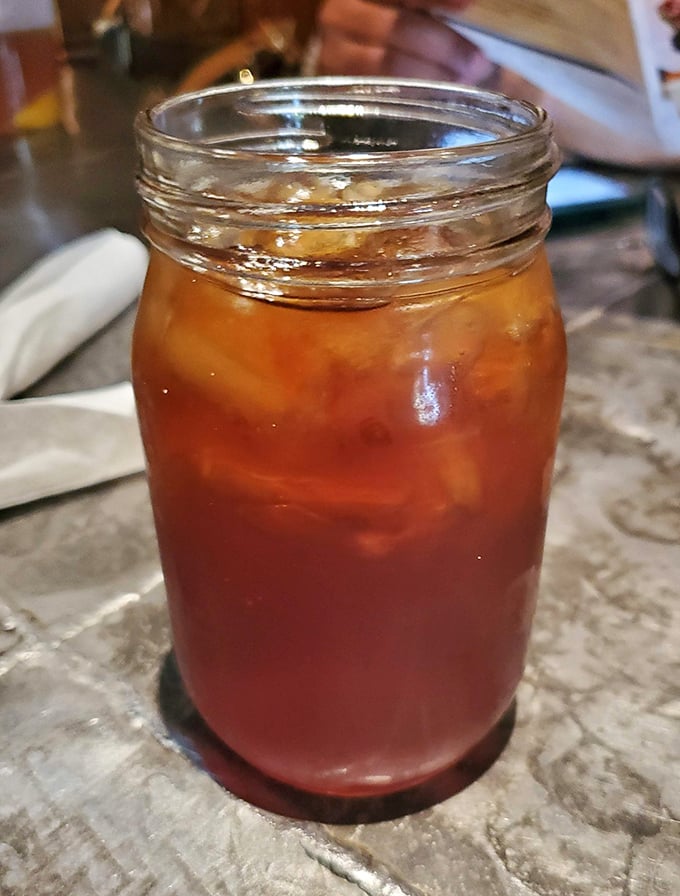 Sweet tea served in a mason jar – the unofficial champagne of the South and the perfect companion to spicy soul food.