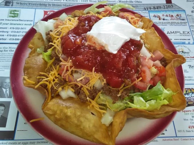 This taco salad isn't trying to be authentic Mexican cuisine—it's pure Midwestern interpretation, where "more is more" is the only acceptable philosophy.