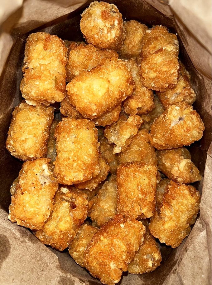 These aren't your freezer aisle tater tots. These golden nuggets of potato perfection have been elevated to an art form worthy of their own fan club.