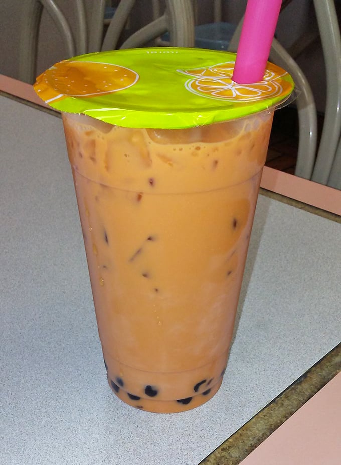 Thai tea with boba pearls – like the desert sun bottled up with a refreshing twist and mysterious little flavor bombs.