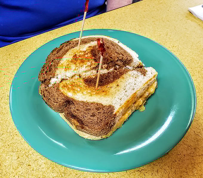 This grilled sandwich isn't just melted—it's transformed. The cheese oozes with purpose, creating the kind of comfort food moment that stays with you all day.