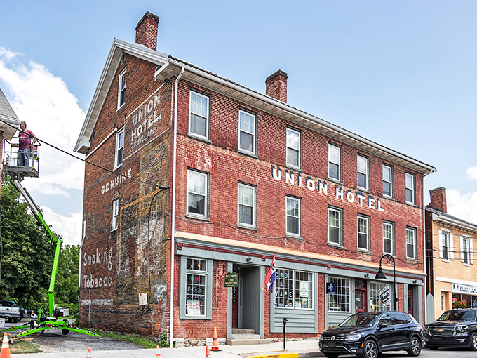 The Union Hotel's weathered brick facade tells stories that Hemingway would appreciate – authentic, unvarnished, and improved with age.