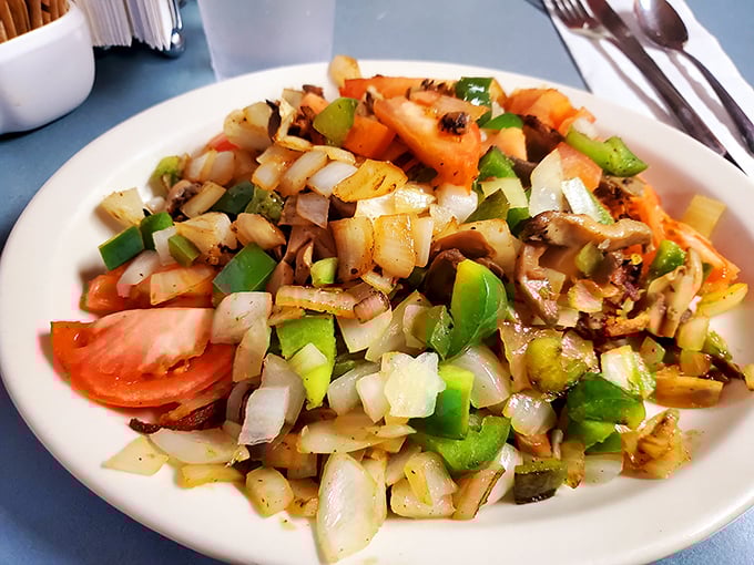 A colorful medley of freshly sautéed vegetables that somehow makes you forget you're eating something healthy in a diner.