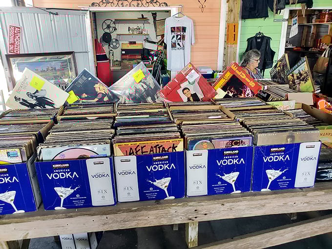 Vinyl paradise housed in vodka boxes—proof that the best music collections often come from the most unexpected storage solutions!