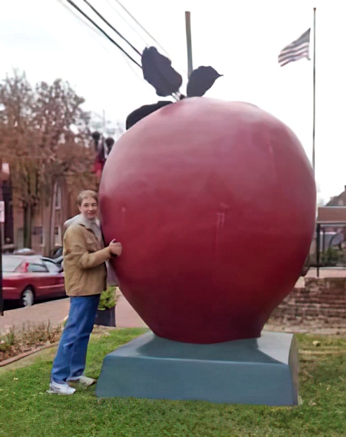 "I'd like to thank the academy for this giant apple..." Visitors can't resist hamming it up with Winchester's oversized fruit.