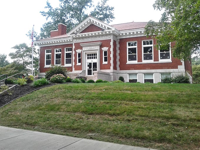 This charming brick library building reminds us that before Google, we had librarians—the original search engines with better recommendations and no pop-up ads.