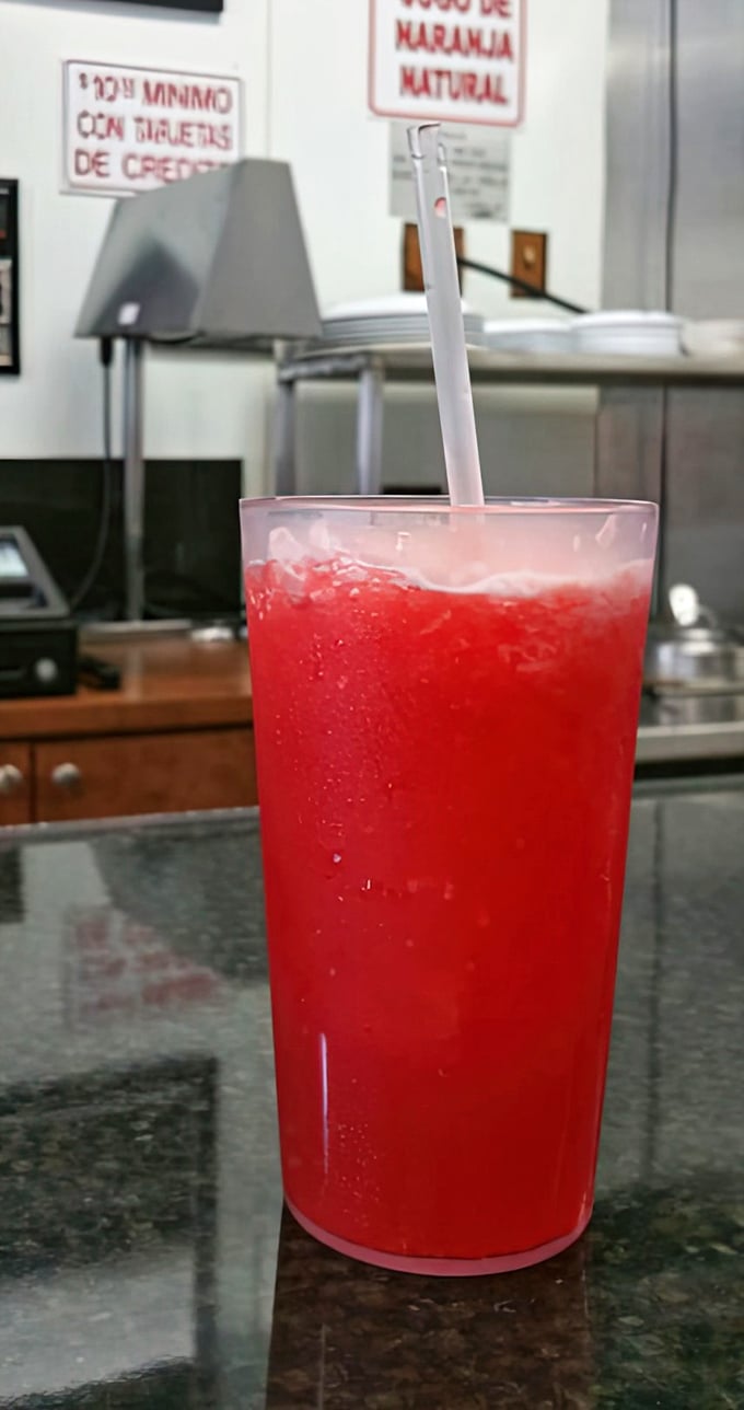 That watermelon juice isn't just refreshing—it's Miami in a glass, the perfect sweet counterpoint to all that savory Cuban goodness.