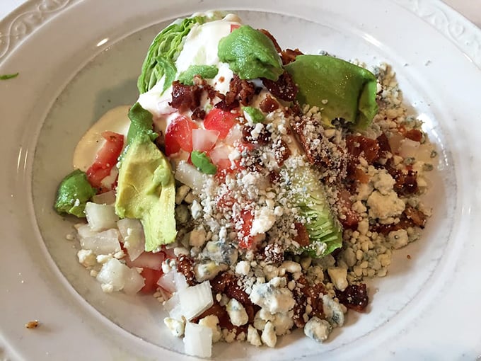 A wedge salad that proves vegetables can be decadent too – loaded with enough toppings to make you temporarily forget about those burgers.