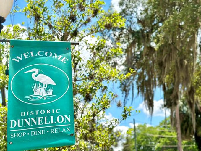 Dunnellon's welcome banner features the town's iconic heron—nature's reminder that the best things in life move at a deliberate, unhurried pace.
