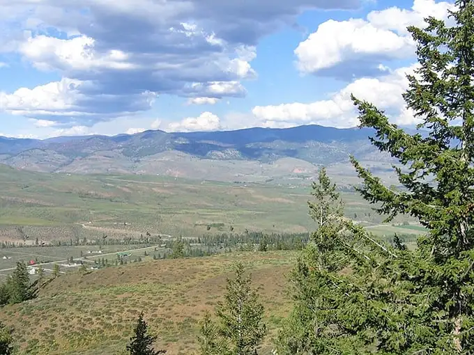 The Methow Valley unfolds like nature's quilt—patches of forest, meadow, and distant peaks stitched together by invisible threads of mountain air.