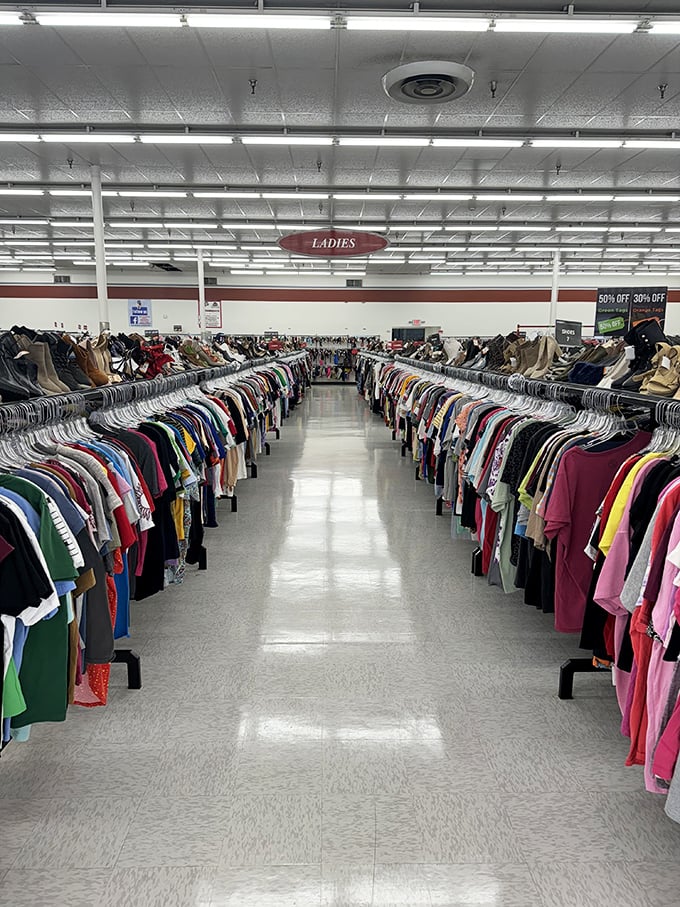 The women's section stretches toward infinity—a kaleidoscope of colors, patterns, and possibilities that would make Joan Rivers proud.