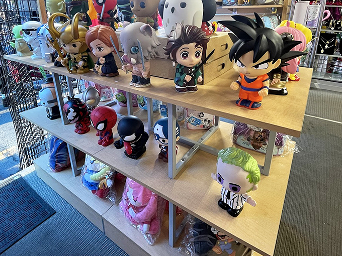 Anime and superhero figurines standing guard over childhood nostalgia—Goku, Spider-Man, and friends waiting for collectors to rescue them.