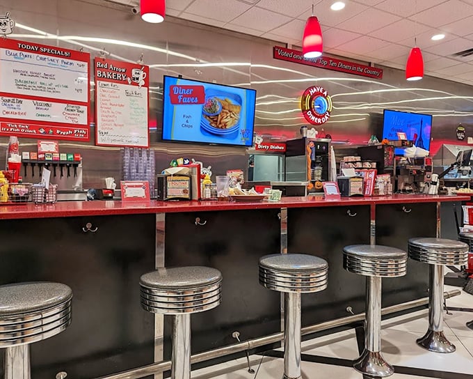 The counter – where solo diners become temporary family and the coffee cup never reaches empty before being refilled.