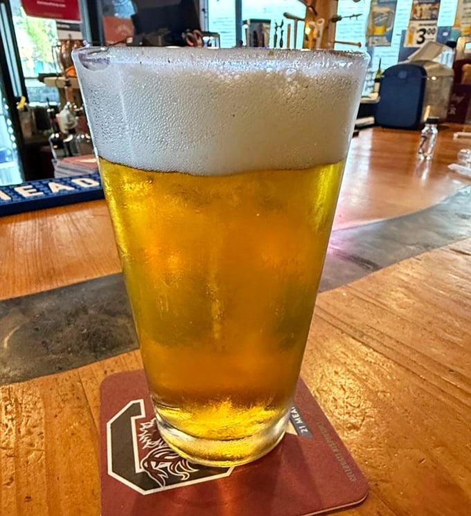 A cold beer with a perfect head—nature's way of saying "you've earned this" after a long day of adulting.