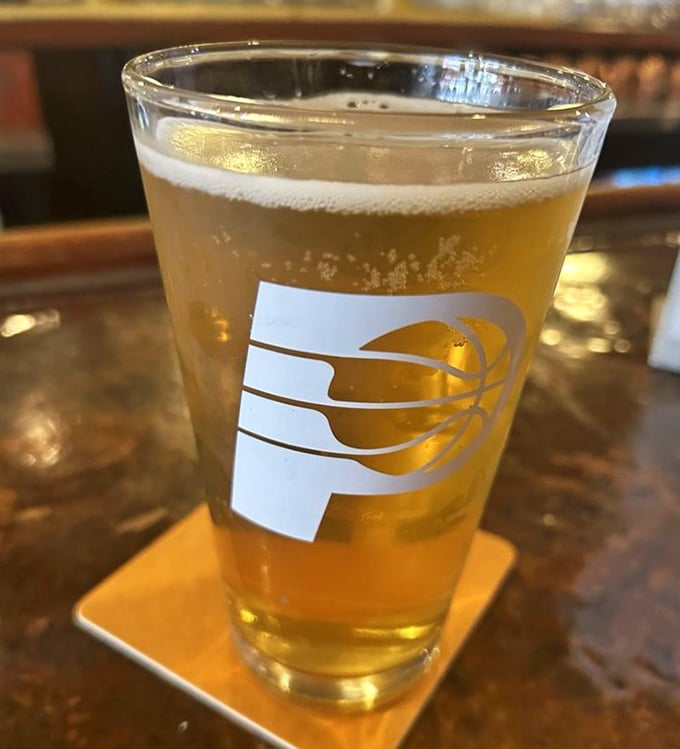 Nothing complements smoked meat quite like a cold local brew – this golden glass is practically begging to join your barbecue adventure.
