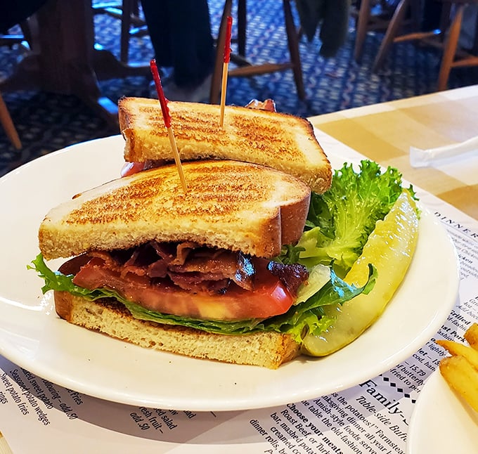 A BLT that reminds you why simple classics endure – crispy bacon, fresh veggies, and bread toasted to golden perfection.