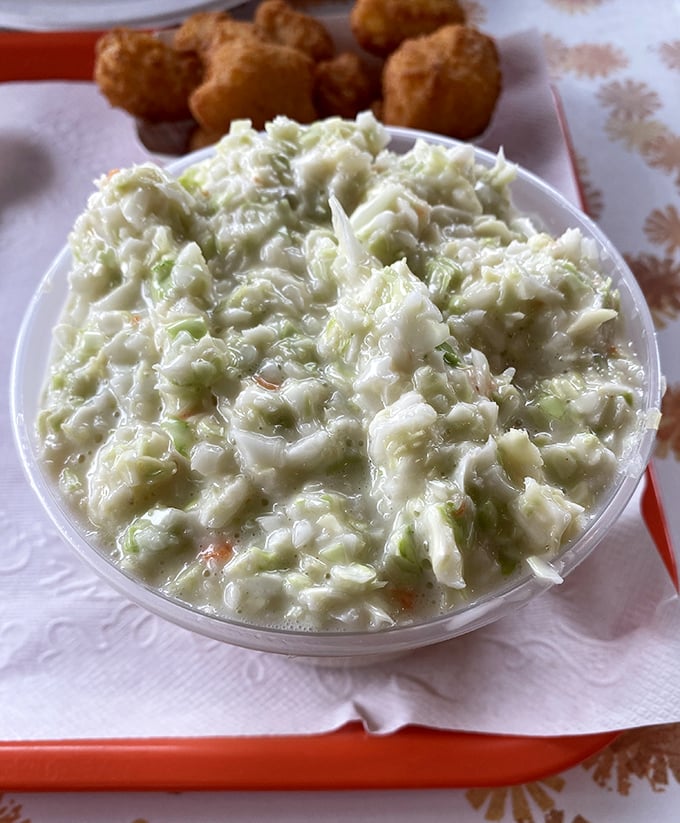Coleslaw that actually deserves respect—creamy, crunchy, and clearly made by someone who understands balance is everything in life.