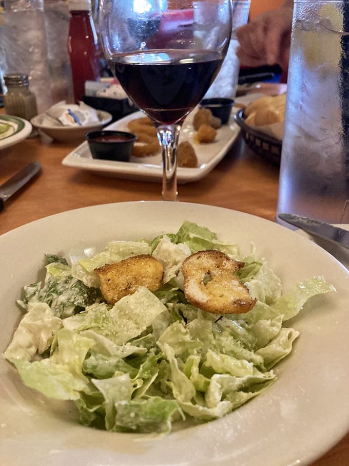 A Caesar salad that knows its role—the opening act before the headliner. Those homemade croutons aren't just bread with ambition; they're crispy perfection.