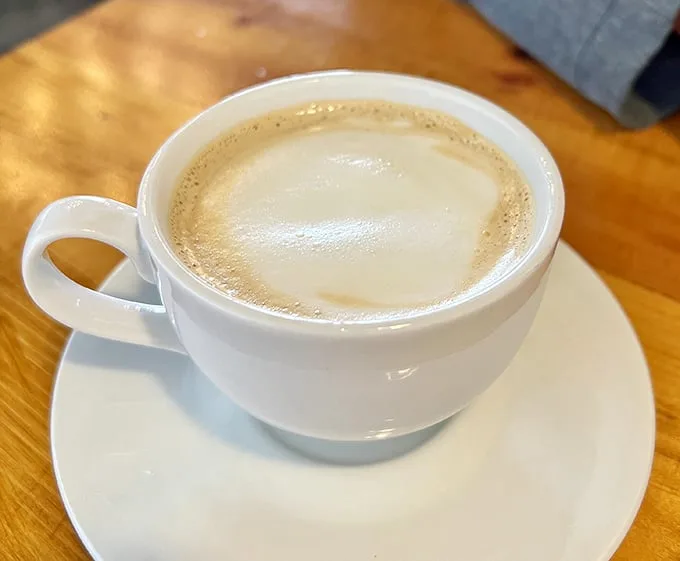 Coffee isn't just a beverage here—it's a supporting actor that deserves its own award for keeping the breakfast symphony perfectly balanced. 