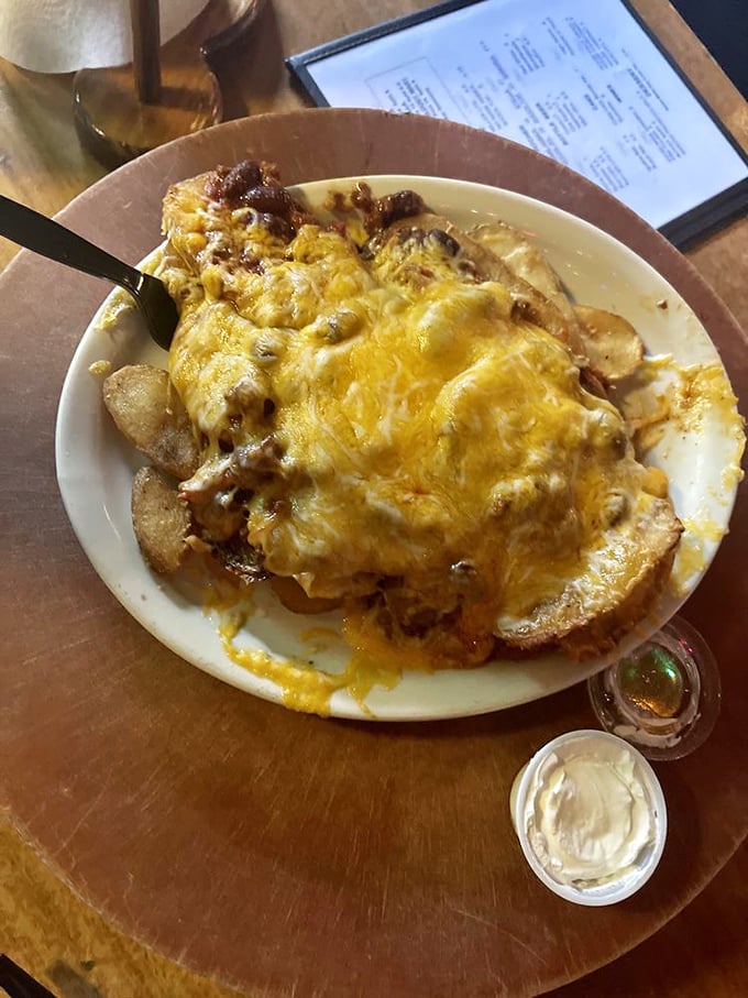 Behold the chili cheese fries—where comfort food gets a vacation upgrade that your diet plan definitely didn't approve.