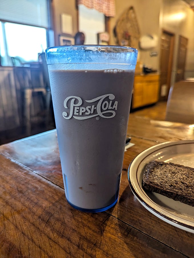 That blue Pepsi glass isn't just holding a drink – it's holding memories of simpler times when soda fountains were social hubs and calories didn't count.