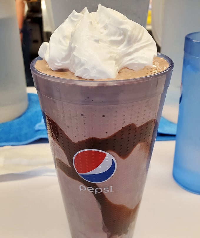 A chocolate milkshake so thick and creamy it requires both a straw and spoon—and possibly a moment of silence to appreciate its magnificence.