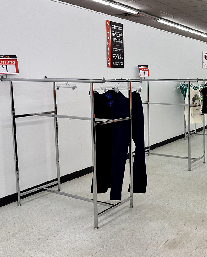The lonely pants display whispers, "Where have all the bargain hunters gone?" Don't worry—they'll be stripped bare by closing time.