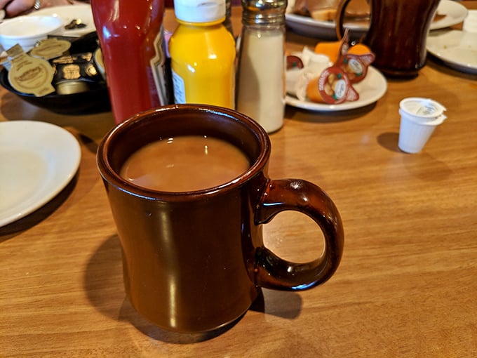 The humble brown coffee mug—steadfast companion to countless conversations and the perfect vessel for what might be the Midwest's most reliable cup of joe.