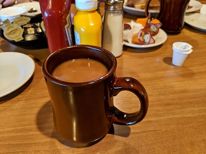 The humble brown coffee mug—steadfast companion to countless conversations and the perfect vessel for what might be the Midwest's most reliable cup of joe.