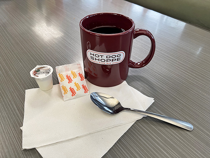 That burgundy mug isn't just holding coffee—it's cradling liquid ambition for your day ahead. The perfect companion to any Jib Jab feast.