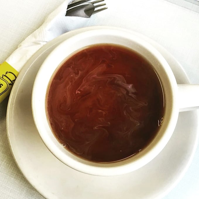 Coffee at a diner isn't just a beverage – it's a supporting character in the story of your meal, keeping the conversation flowing as steadily as the refills.