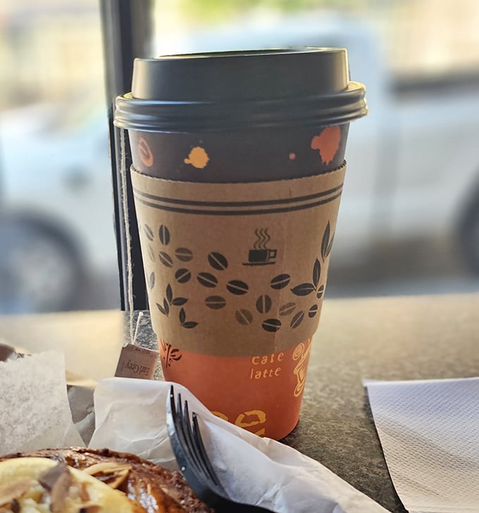Coffee in a proper cup with a pastry on the side—civilization's greatest achievement since indoor plumbing and possibly more essential on Monday mornings.
