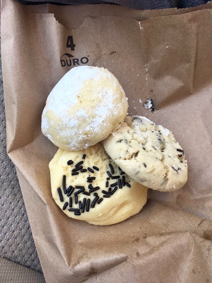 Three little cookies in a paper bag – simple, unassuming, and about to deliver more joy than most fancy restaurant desserts ever could.