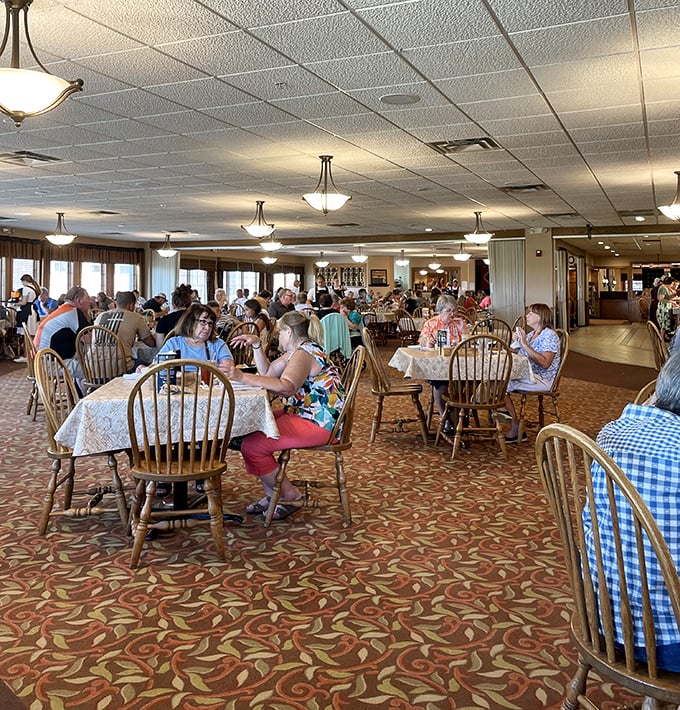 The dining room hums with the universal language of satisfaction – forks meeting plates, ice clinking in glasses, and the occasional "you've got to try this."