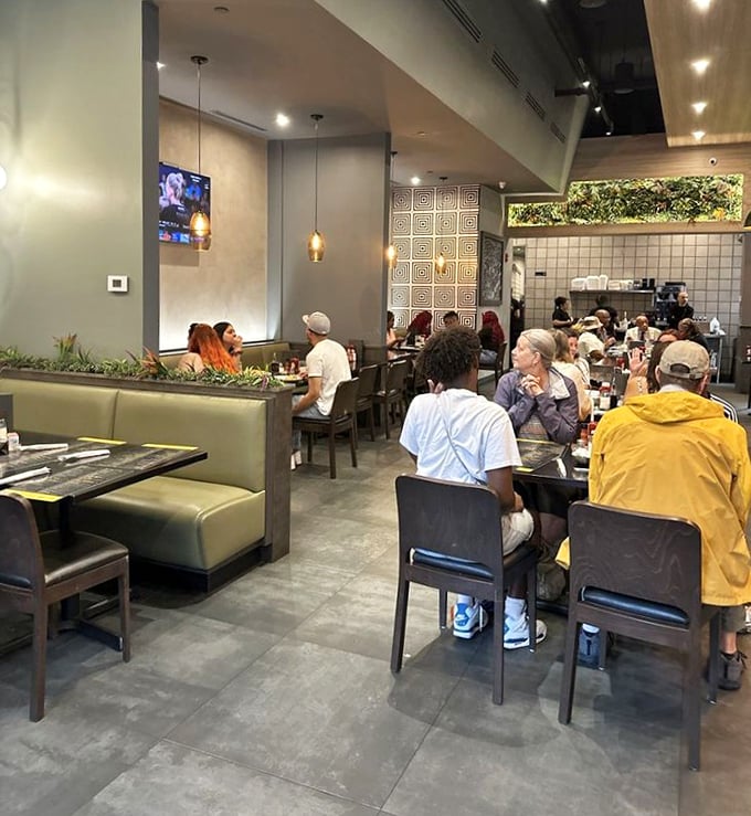 The dining room hums with satisfaction—a modern breakfast temple where Detroit comes to worship at the altar of perfectly poached eggs.