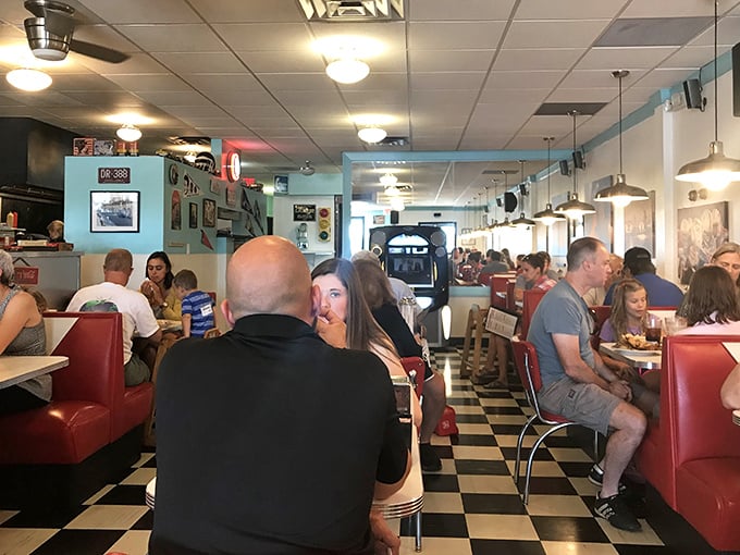 The dining room buzzes with conversation and clinking silverware – a community gathering place where strangers become neighbors over coffee.
