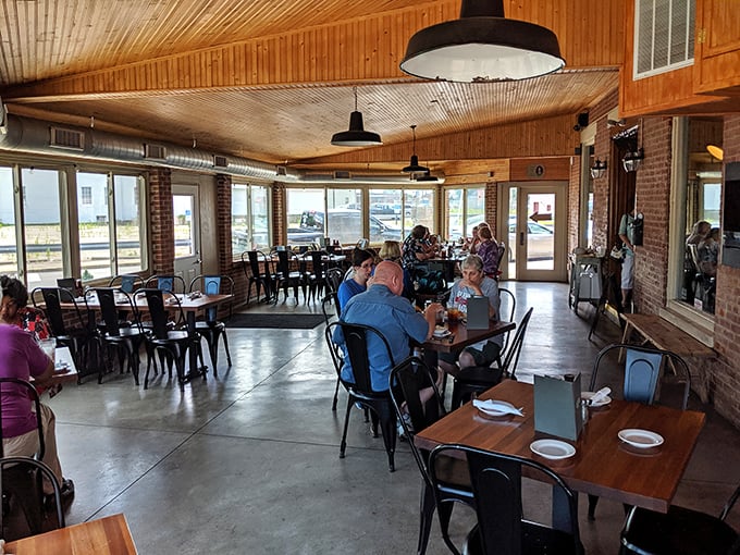 The dining room hums with the universal language of "mmm" as patrons engage in the serious business of barbecue appreciation.