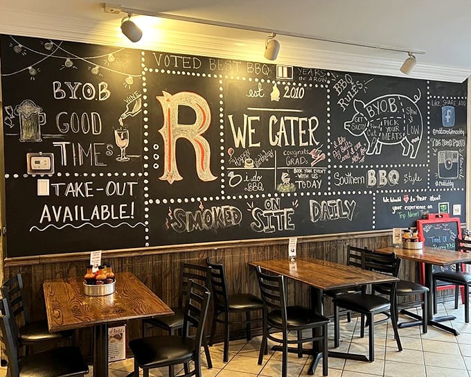 The chalkboard wall isn't just decor—it's a manifesto for those who believe good barbecue is worth celebrating.