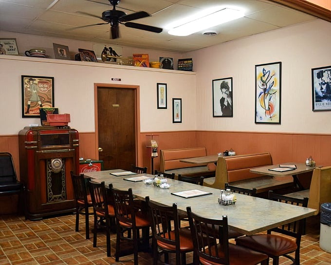 Elvis watches over diners from his place on the wall, probably wishing he could join them for a plate of those legendary biscuits.