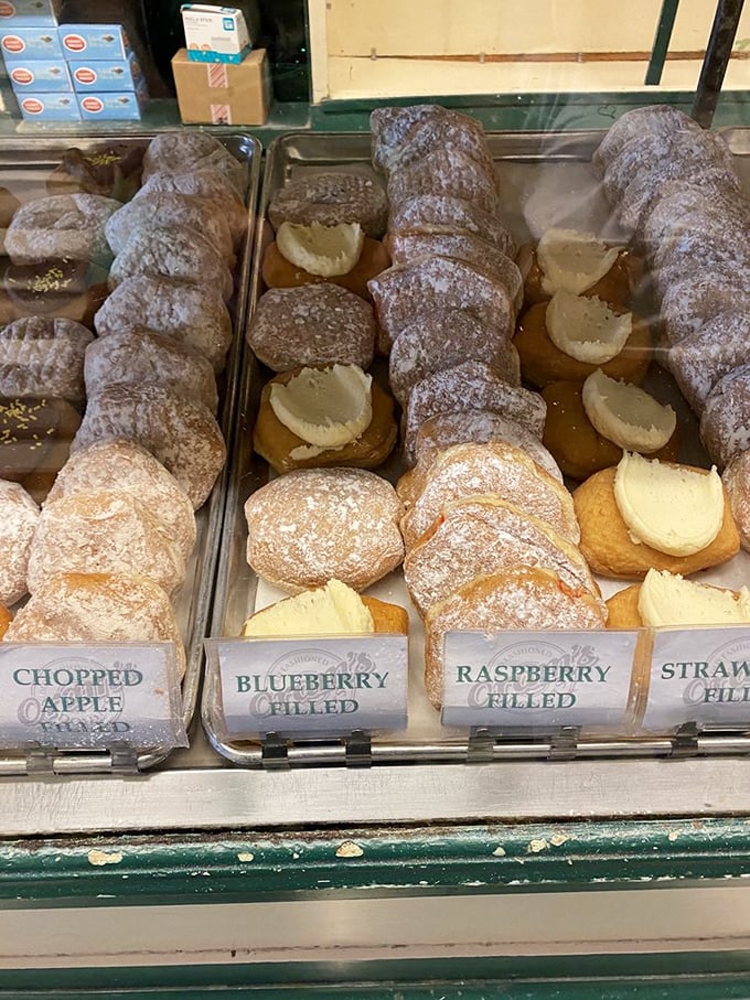 The display case at Oram's—where diet plans go to die and happiness is served by the dozen.