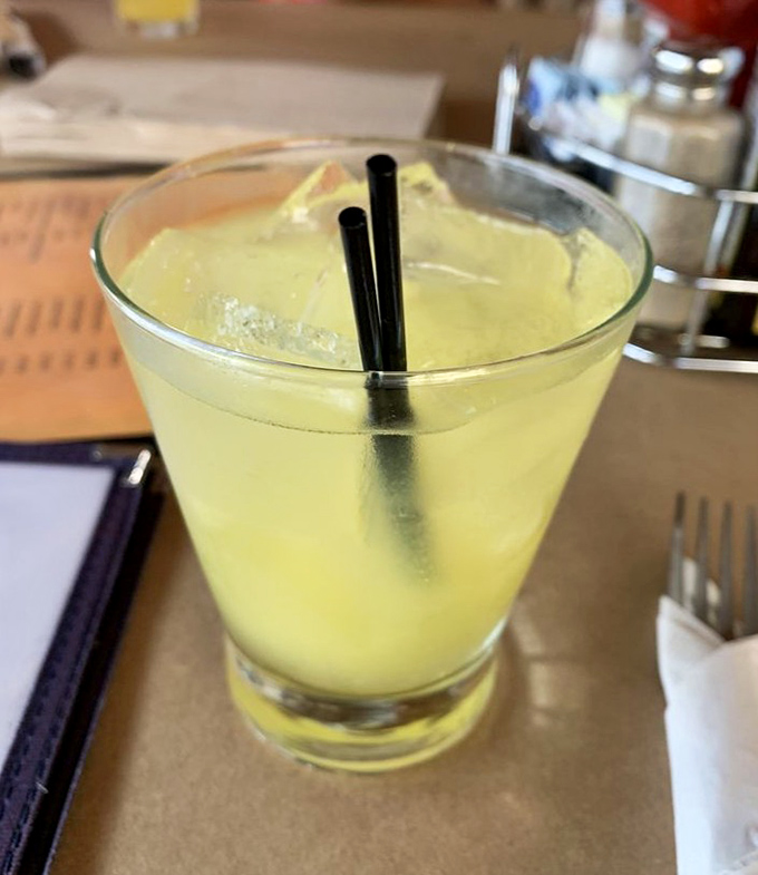 A tall glass of sunshine-yellow lemonade – the perfect counterpoint to rich seafood. Simple pleasures are often the most satisfying.