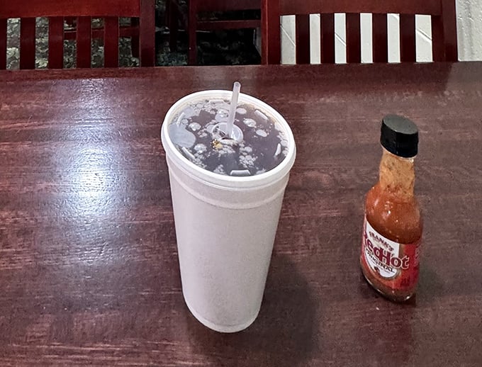 A frosty soda and hot sauce – the dynamic duo that's been supporting great fried chicken since before Instagram food photos were a thing.