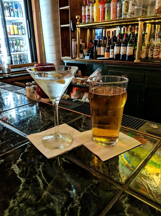 A proper pint and a classic martini – because sometimes civilization is measured by how well a bar can execute the basics.