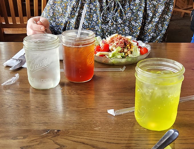 Mason jar drinks served with country flair—because somehow sweet tea and lemonade just taste better when sipped from proper glass jars.