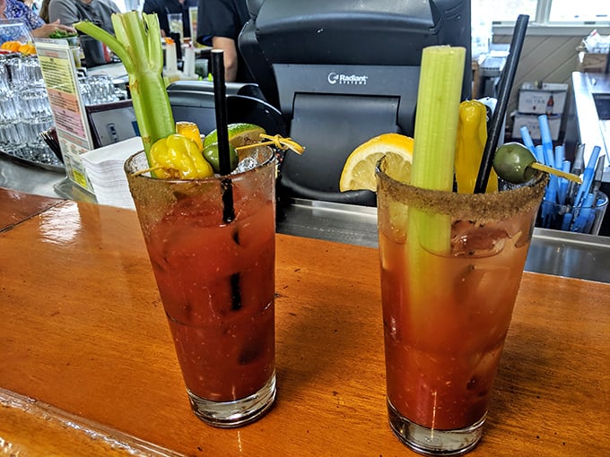Those Bloody Marys aren't just drinks—they're appetizers, beverages, and conversation pieces all in one towering glass.