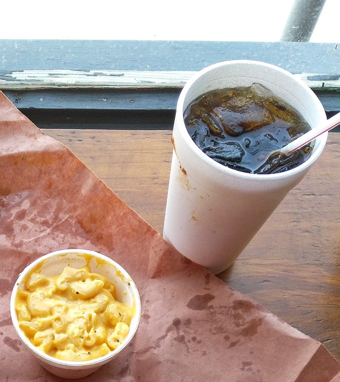 A simple cup of soda and mac and cheese – proof that sometimes the supporting actors deserve just as much applause as the headliners.
