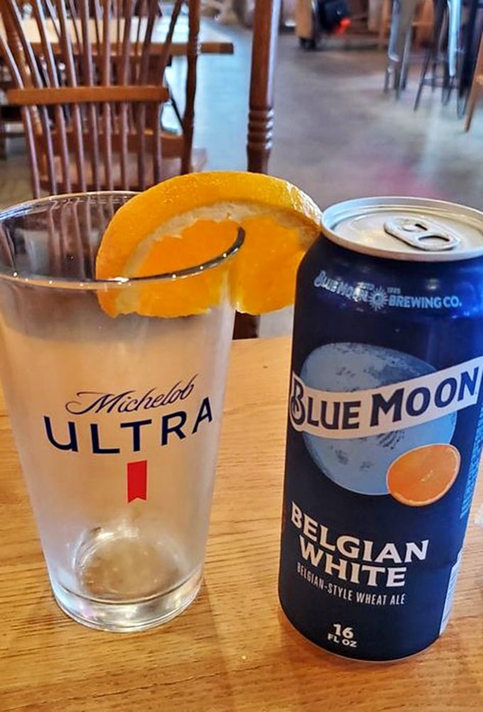 When your beer comes with an orange slice, it's not just a garnish—it's a little vacation in a glass alongside your meat marathon.