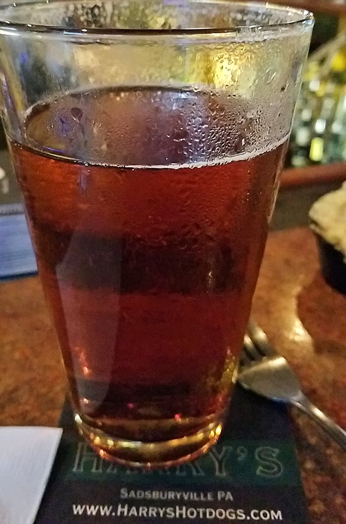 Even the beverages at Harry's come with a side of local pride – served on coasters that remind you exactly where this flavor memory is being made.