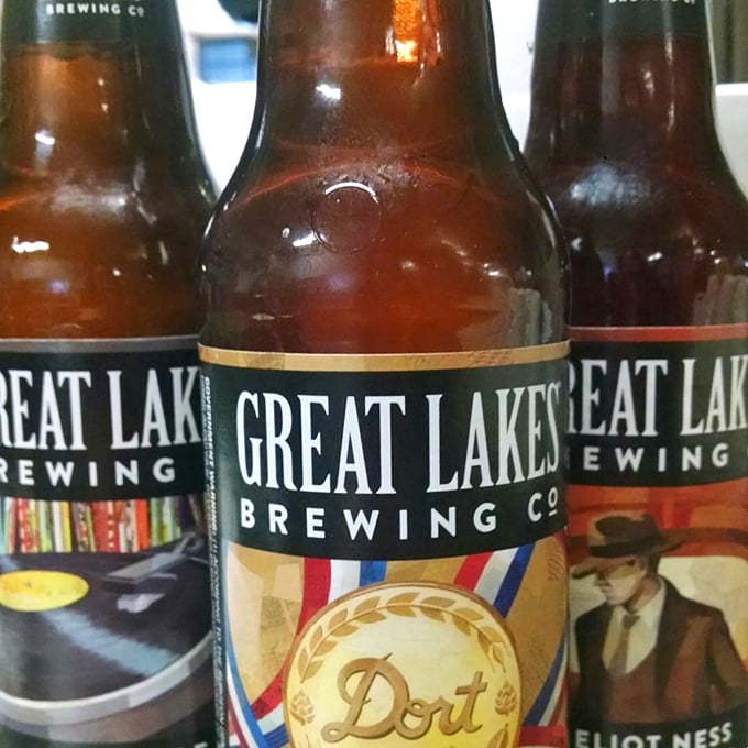 Great Lakes Brewing Company bottles line up like old friends at a reunion—locally crafted liquid happiness that pairs perfectly with prime rib.