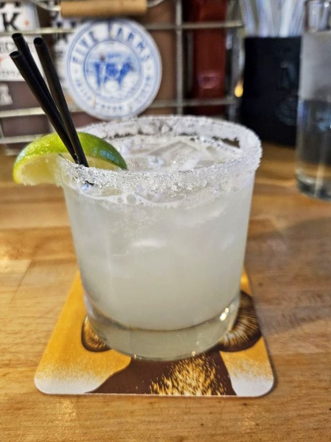 A salt-rimmed margarita—because sometimes you need something bright and zippy to cut through all that smoky richness.